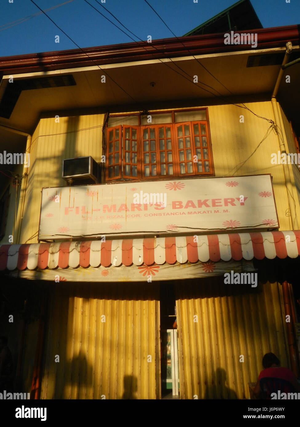 Photograph of J.P. Rizal Street in the Olympia Poblacion area ...