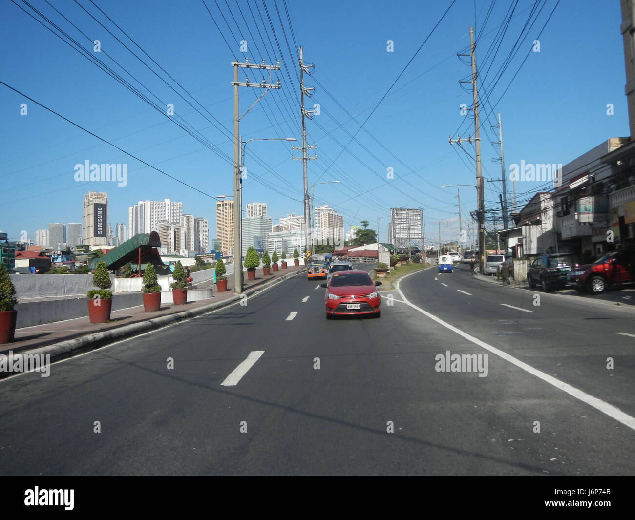 The image focuses on J.P. Rizal Avenue in Makati City, particularly in ...