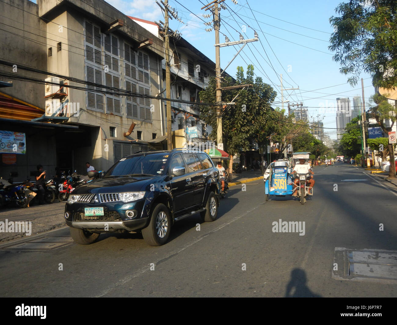 This image shows the busy intersection of Barangays Santa Cruz, San ...
