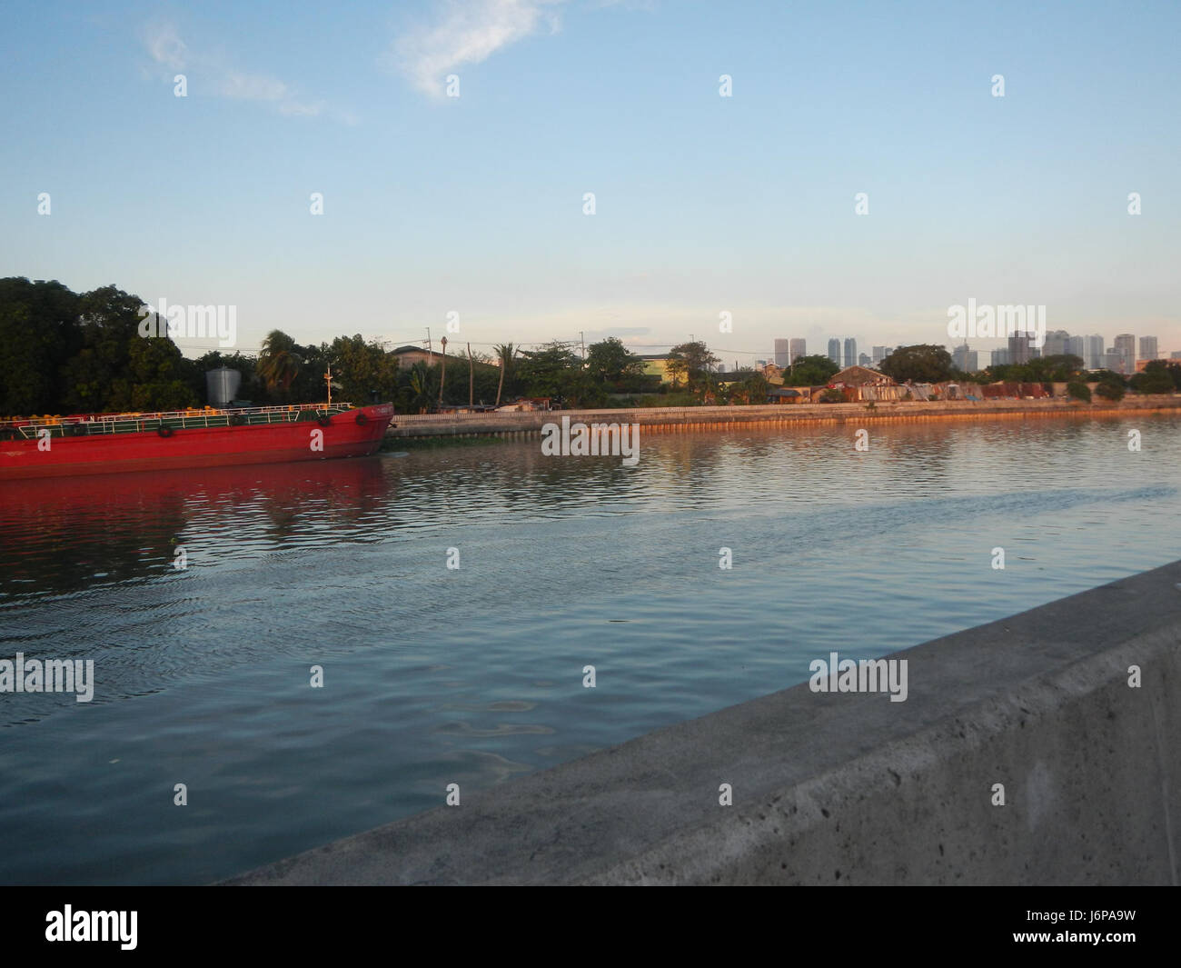 This image showcases the Carmona Sunset Riverfront area, featuring the ...