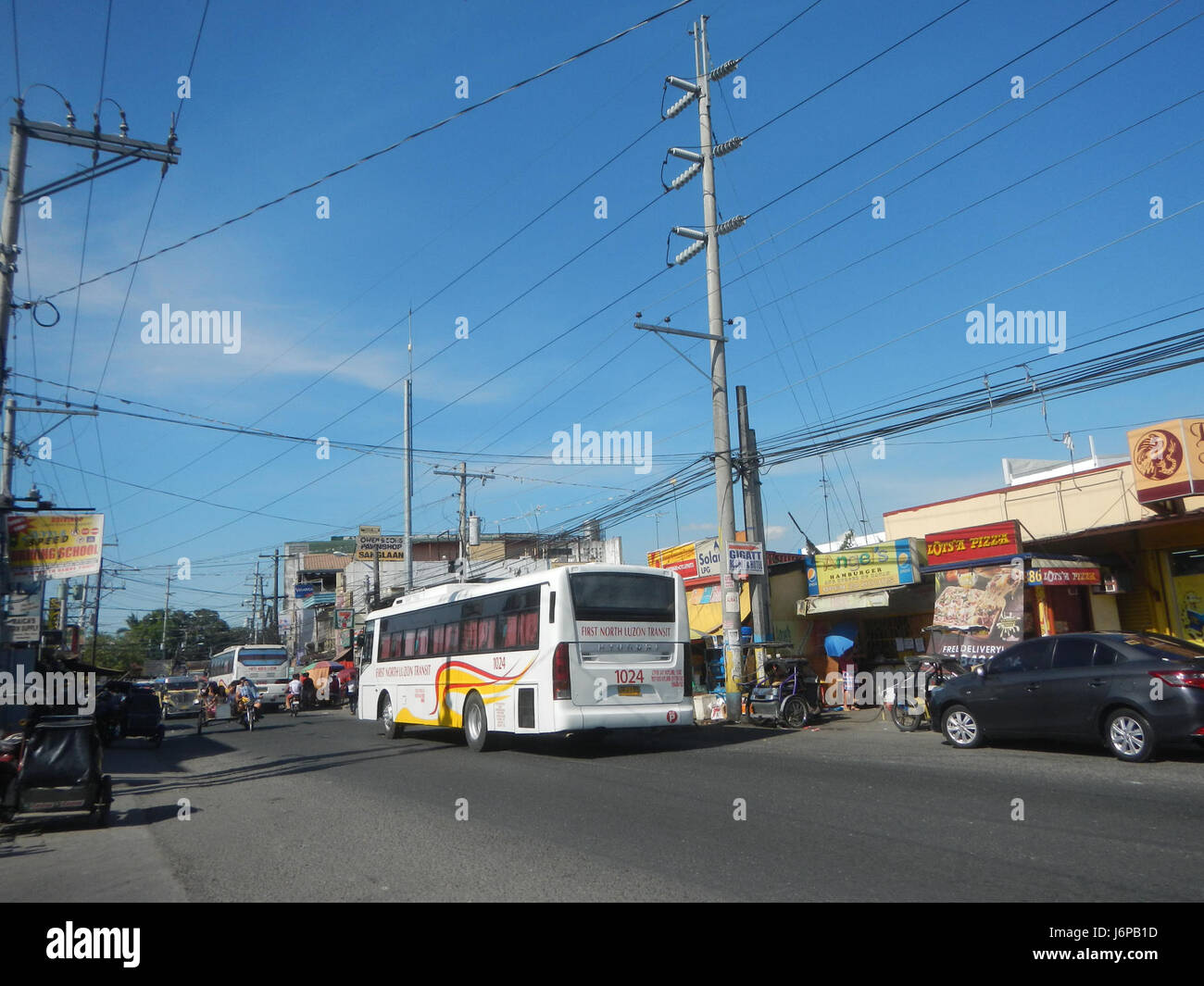 This image depicts C. Dizon Avenue in San Joaquin, Santa Ana, Pampanga ...