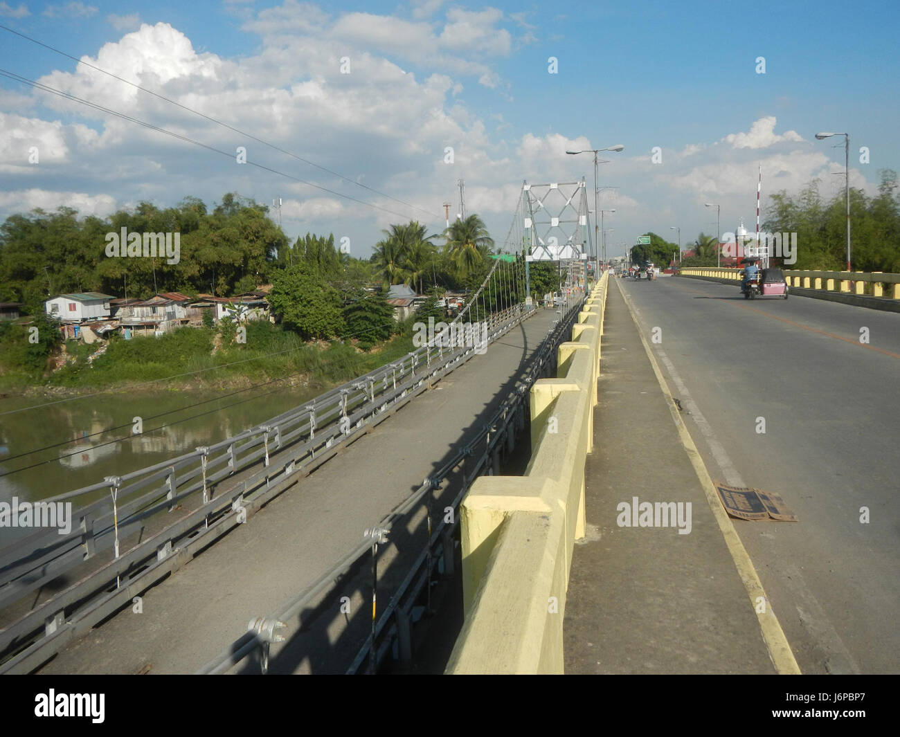 A reference to the Candaba Golden Gate Bridge, a key structure crossing ...