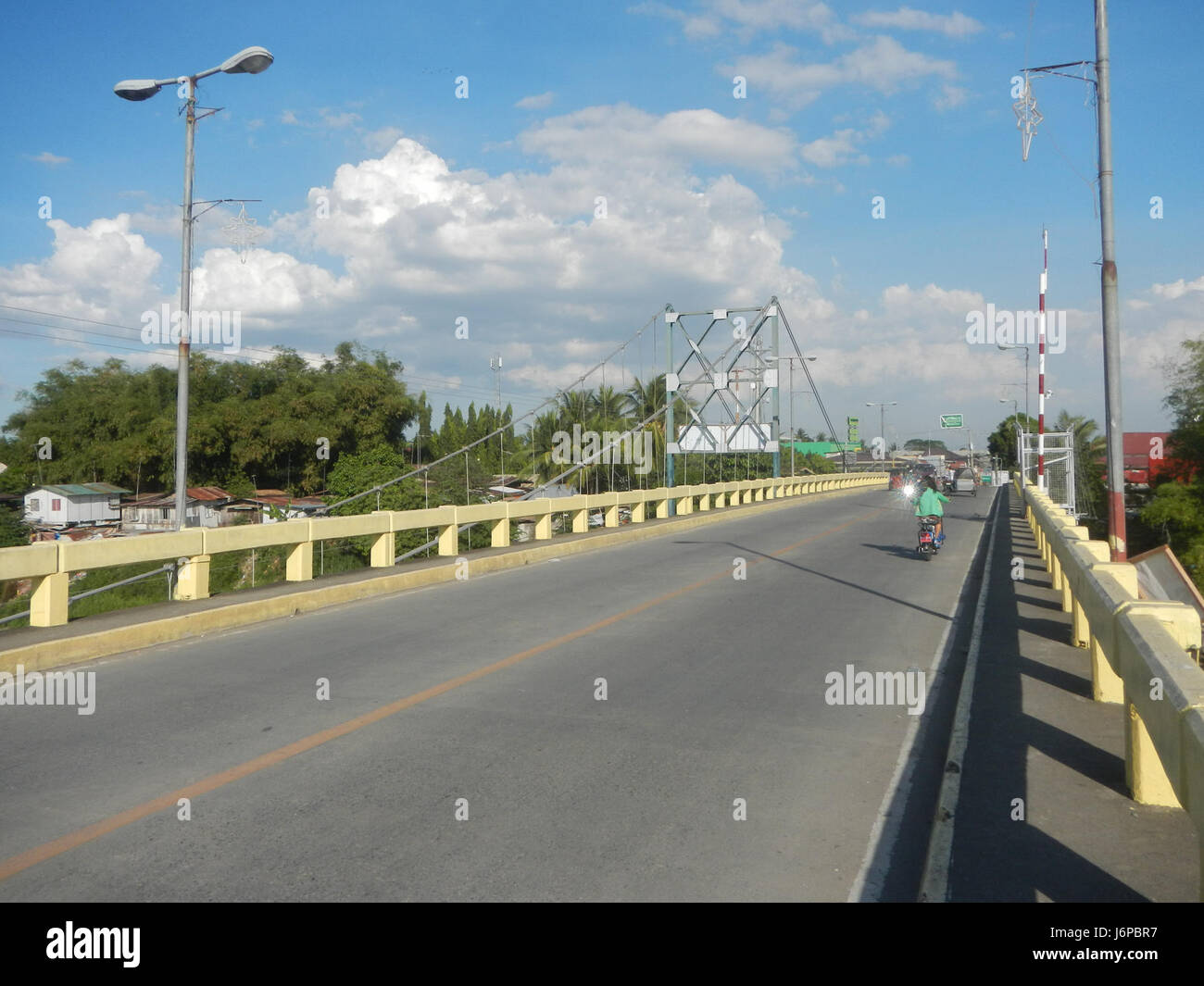 The Candaba Golden Gate bridges, spanning the Pampanga River, are key ...