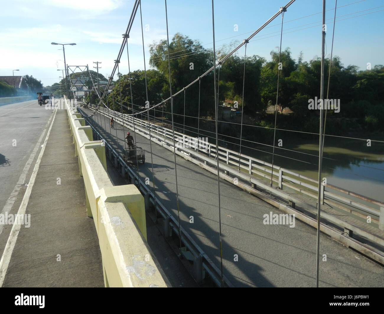 The Candaba Golden Gate Old and New Bridges span the Pampanga River in ...
