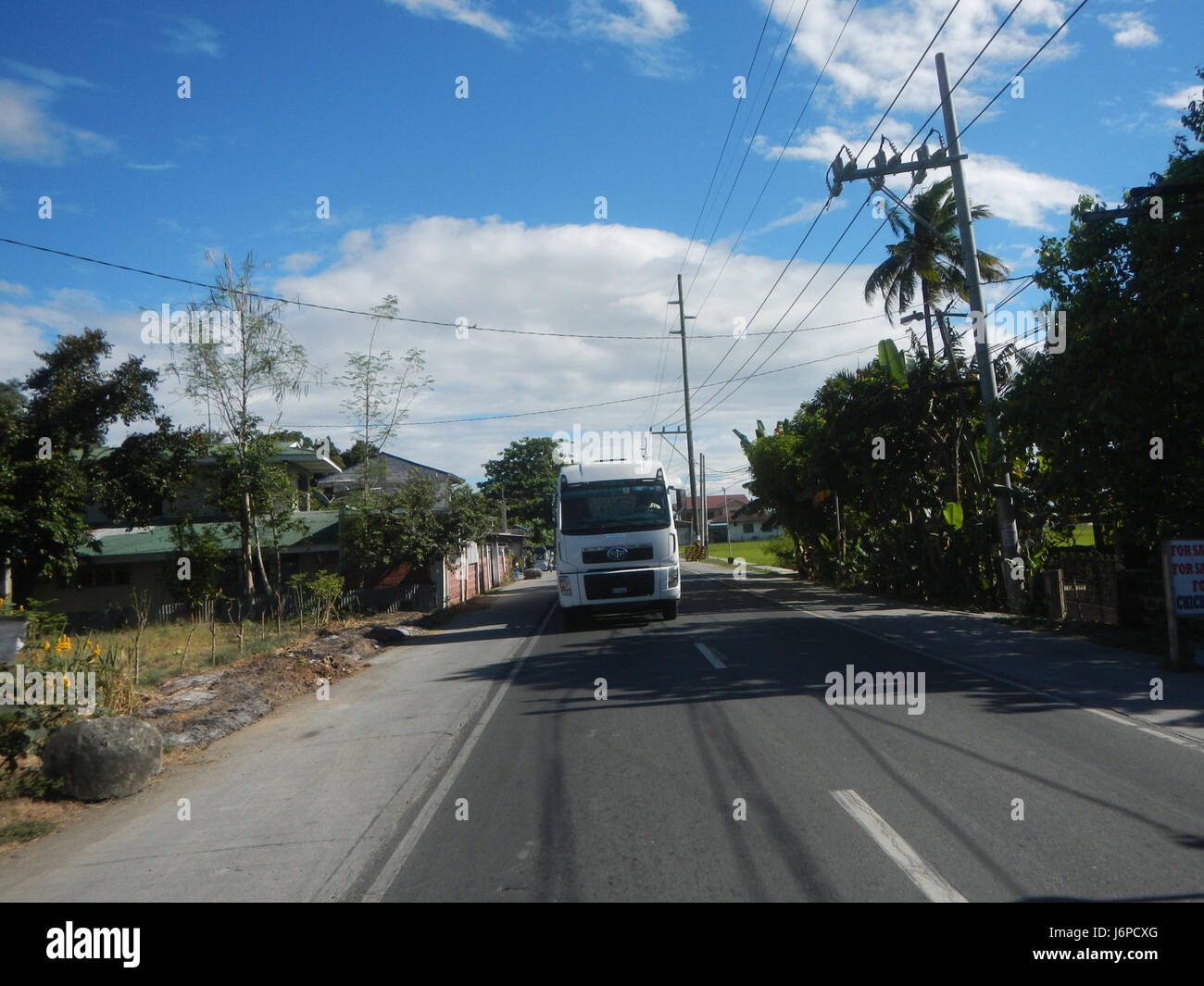 This image depicts a stretch of Road 11 that connects Baliuag, Bulacan ...