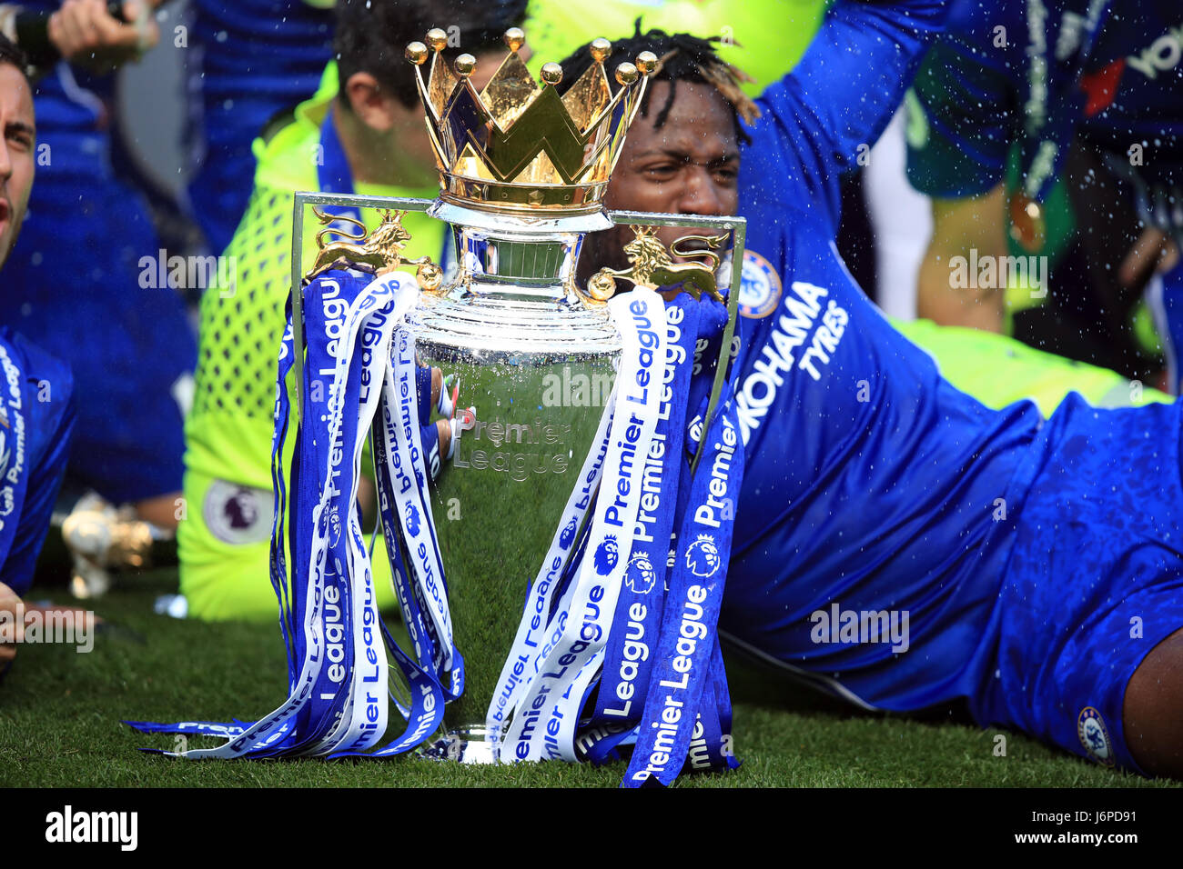 Chelsea's players celebrates with the Premier League Trophy following ...