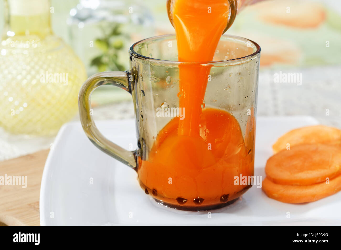Delicious carrot juice with pulp. Selective focus Stock Photo - Alamy