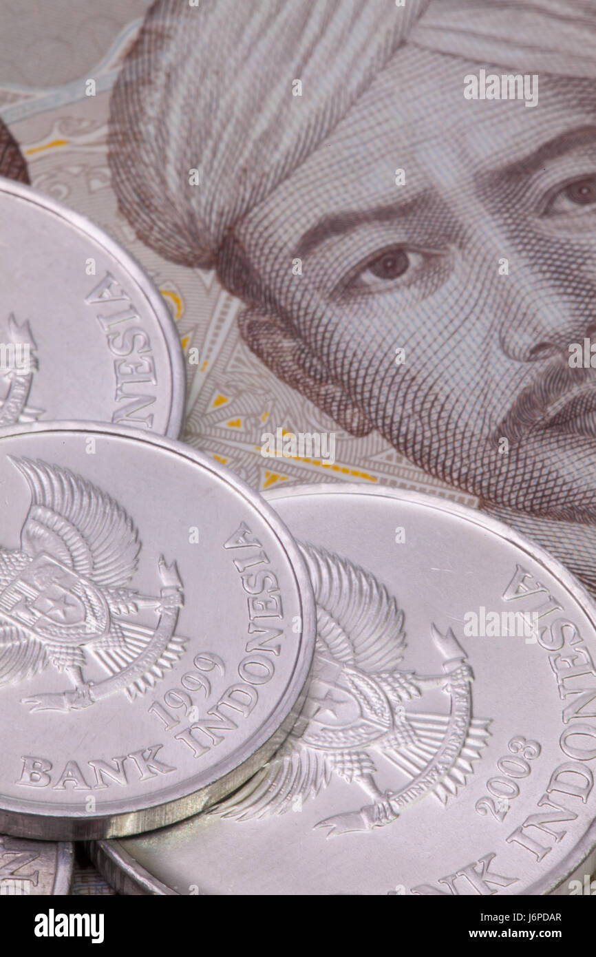 Detail of different Indonesian rupiah coins on the table Stock Photo ...