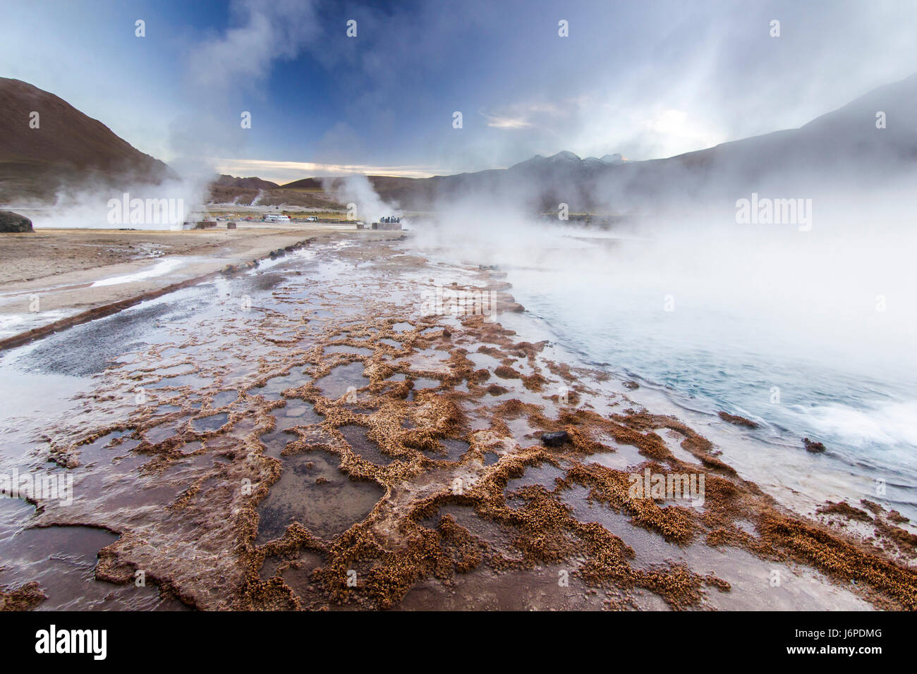 geyser tatio with water surface at sunrise Stock Photo - Alamy