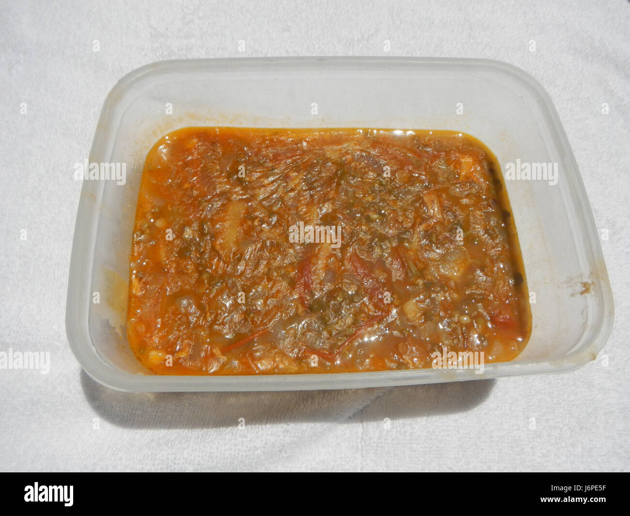 This image depicts a variety of fruits including mangoes and papayas ...