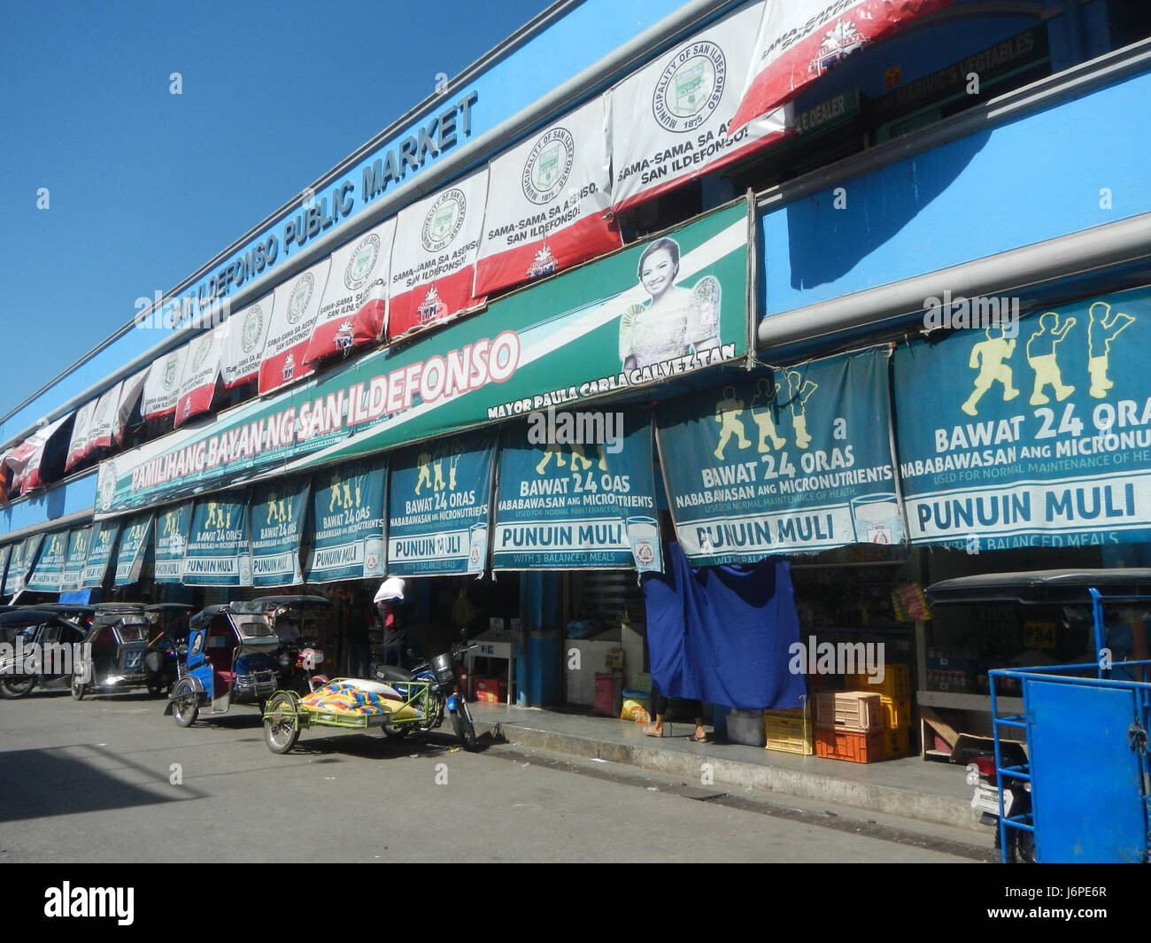 This image showcases the San Ildefonso Public Market in Bulacan, Philippines, highlighting the ...