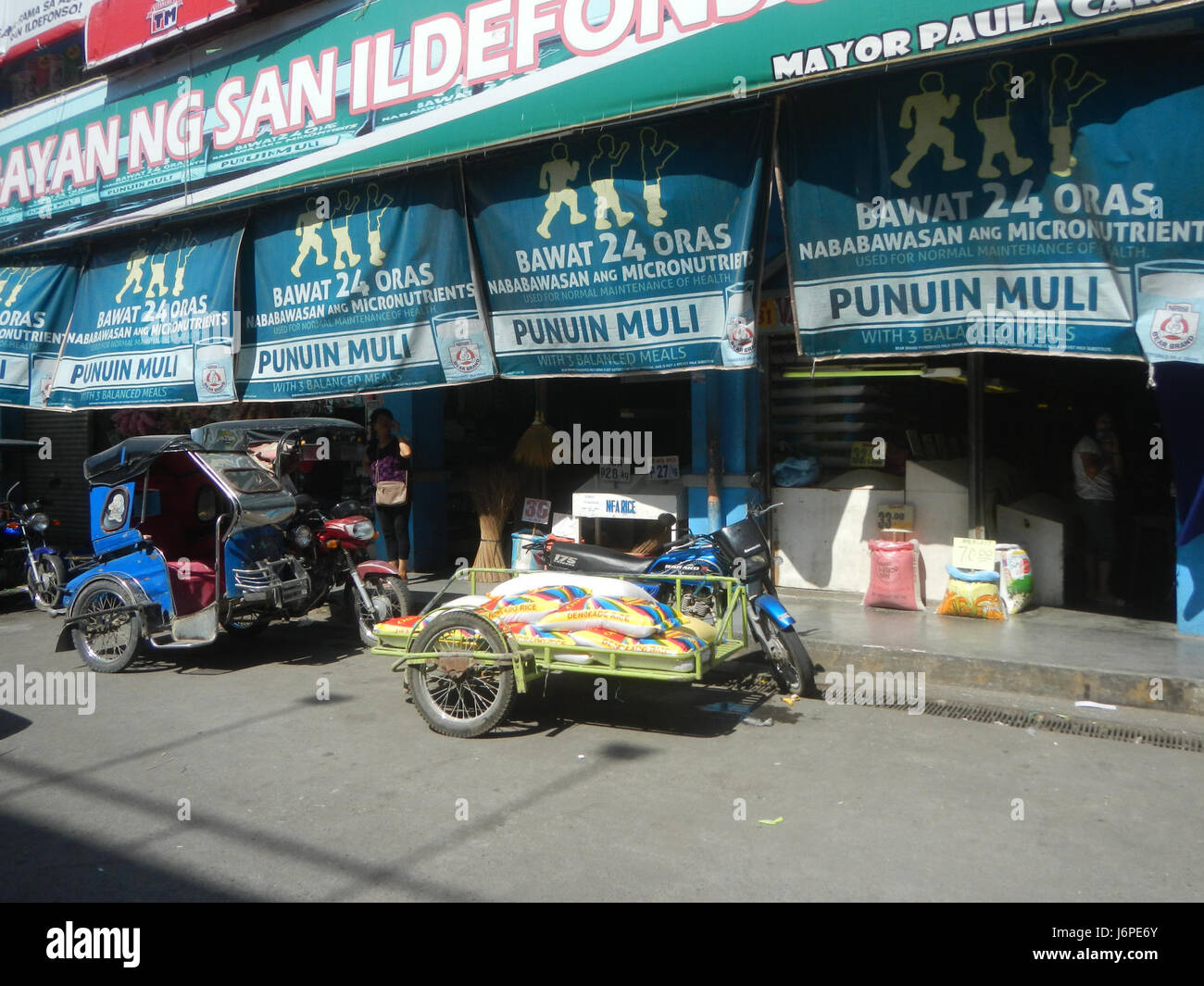 This image depicts the public market in San Ildefonso, Bulacan. The photo captures the market ...