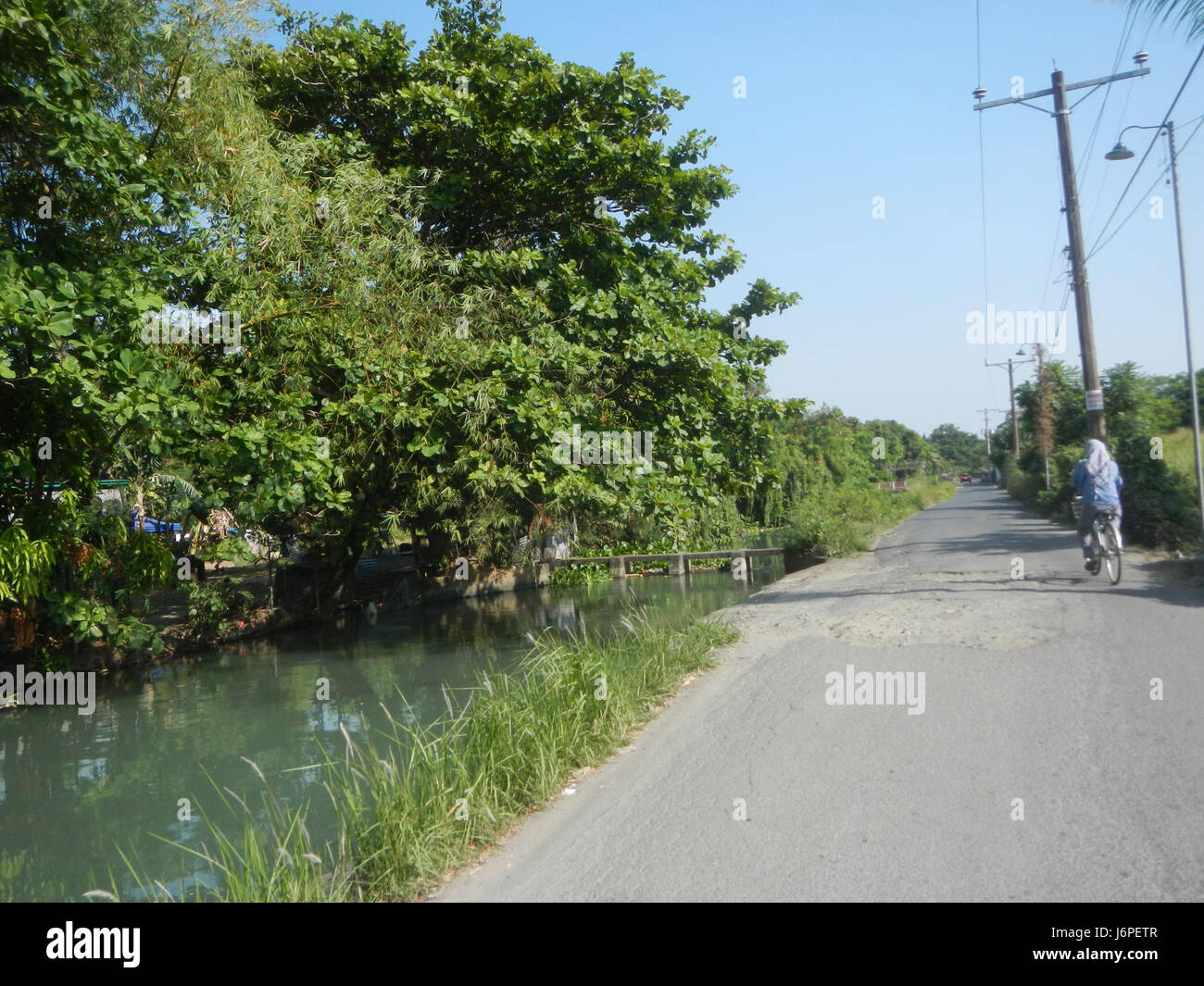 A photograph of the irrigation farm along Market Road 48 in Banga Santa ...