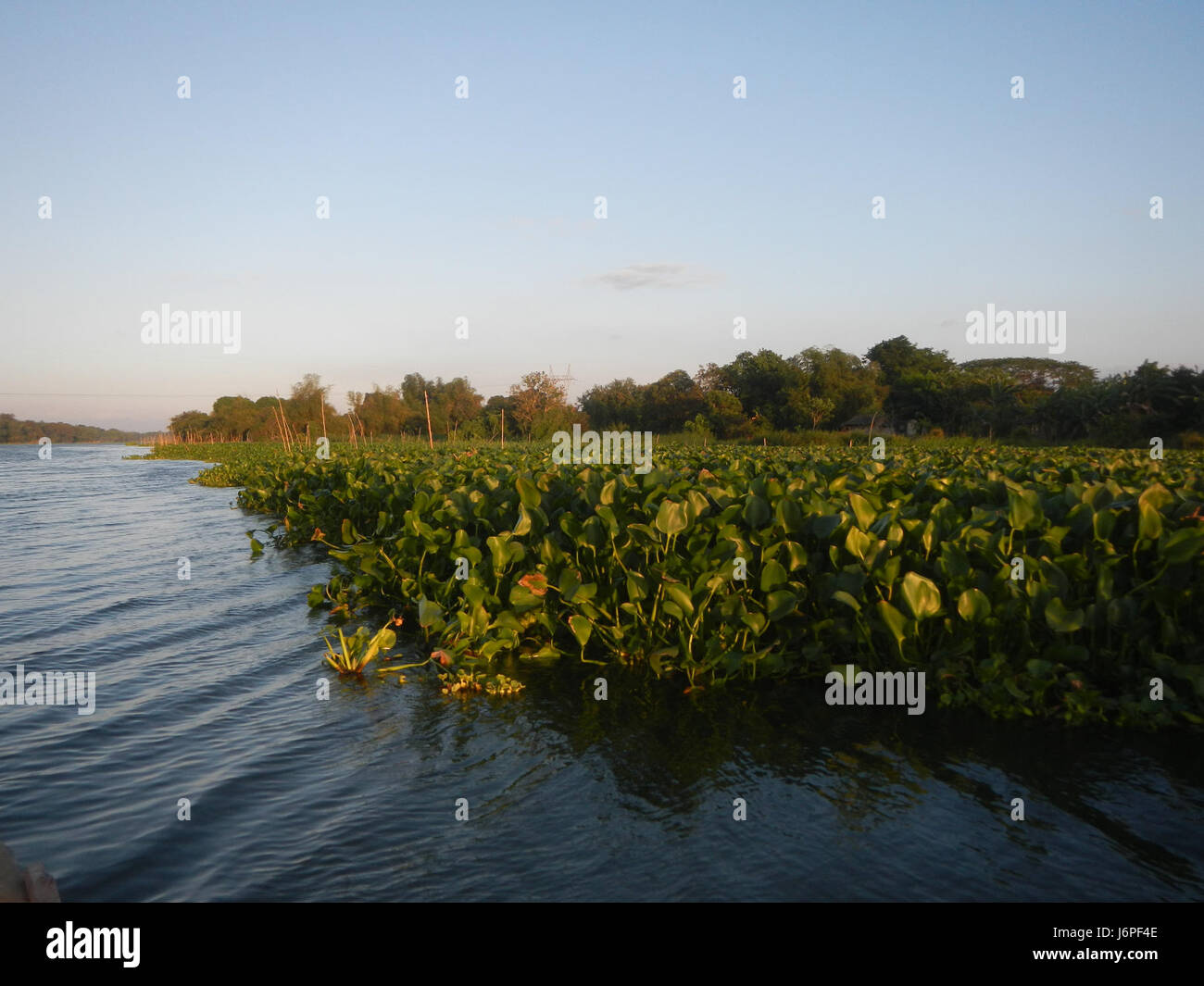 This photograph depicts the riverside districts of Calumpit, Bulacan ...