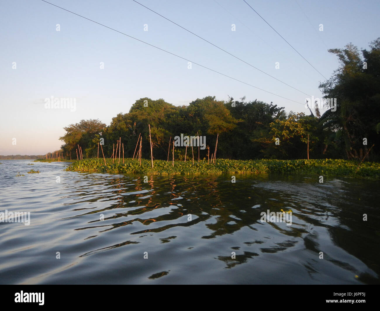 This image depicts various riverside districts in Calumpit, Bulacan ...