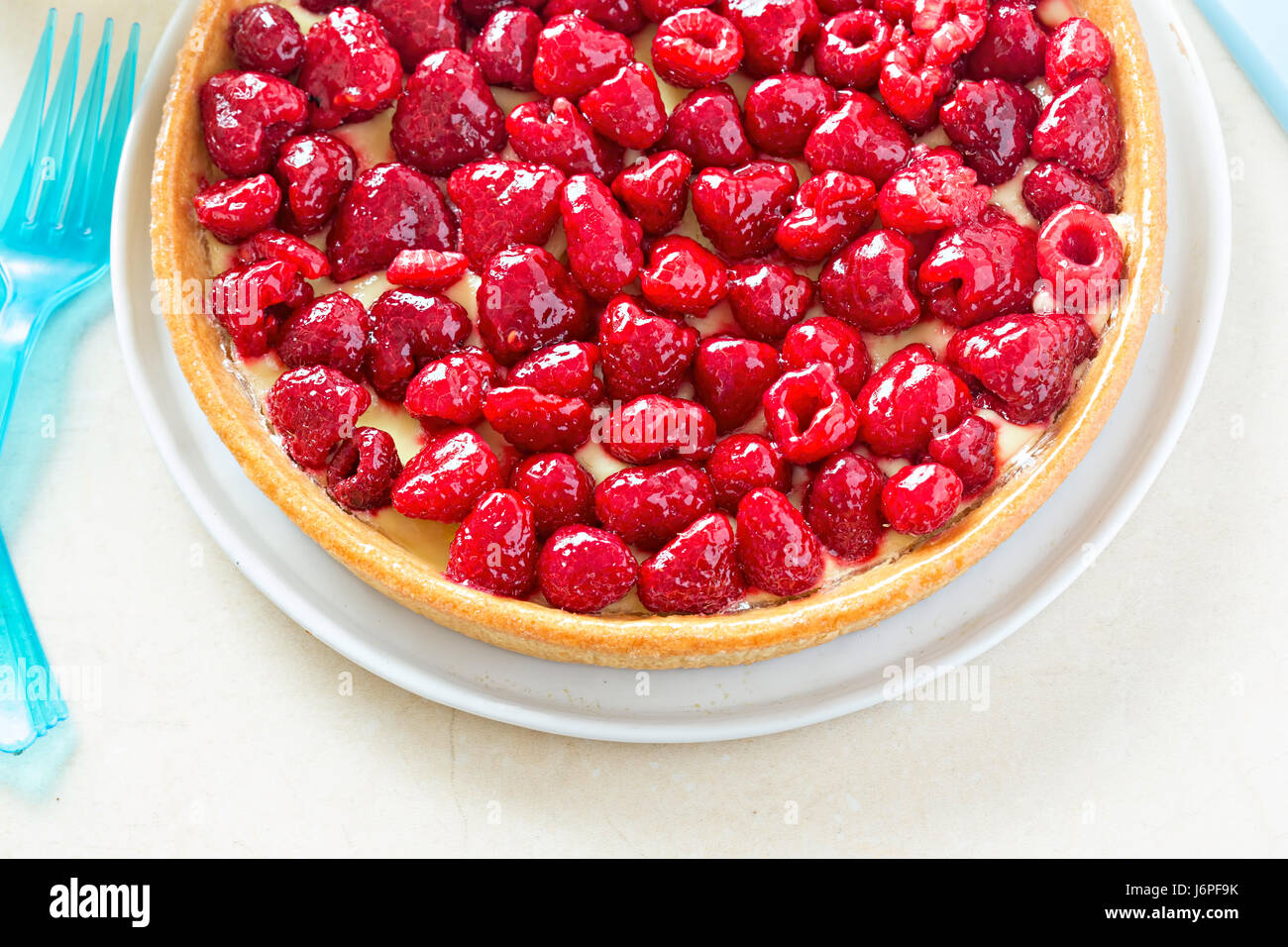 Raspberry tart with lemon filling and shortcrust pastry Stock Photo - Alamy