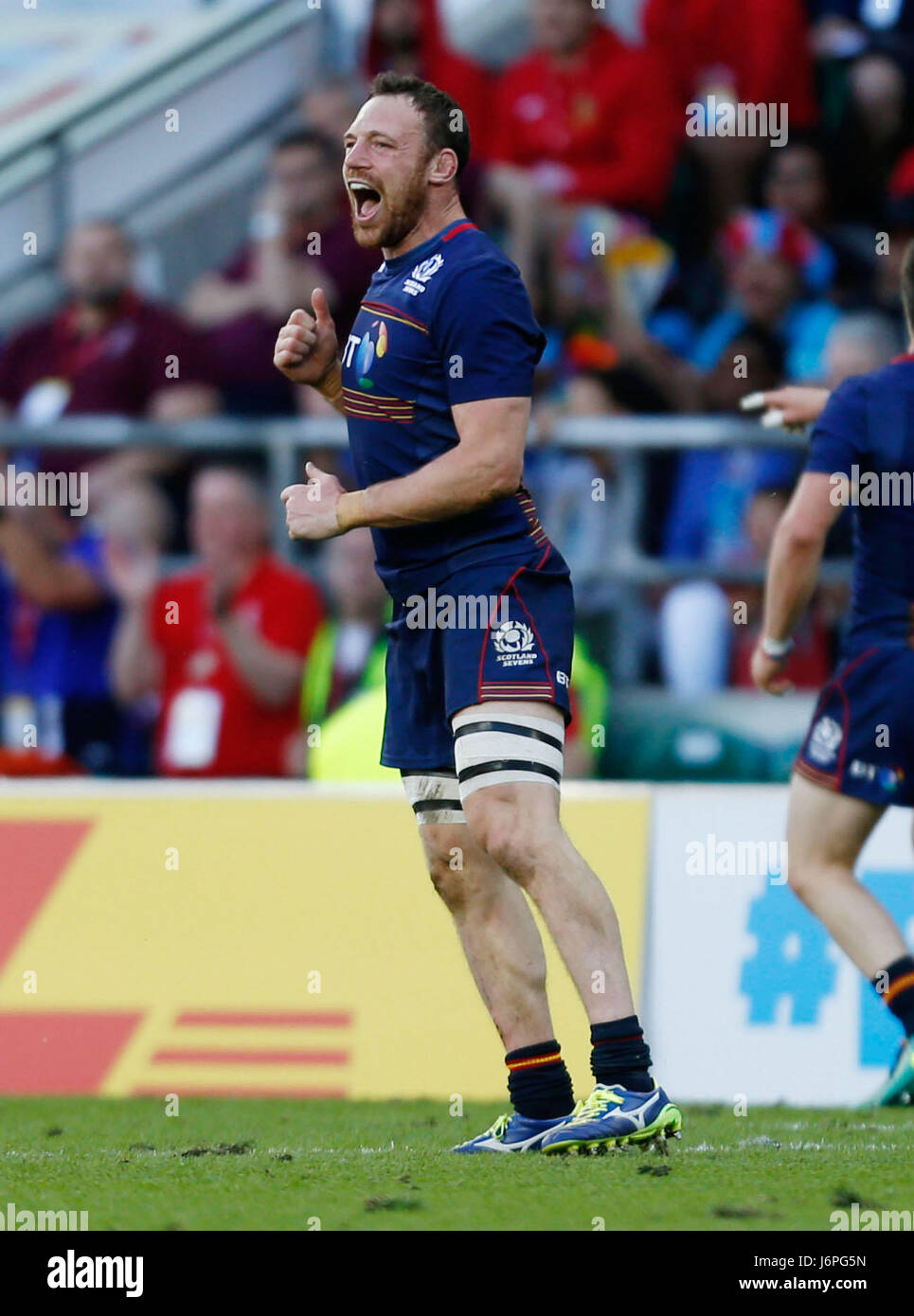 Scotland's Scott Riddell celebrates winning the final against England ...