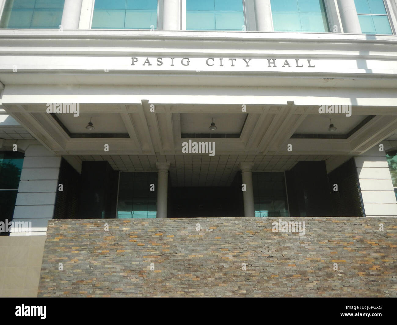 The Pasig City Hall compound features a designated bicycle parking area ...