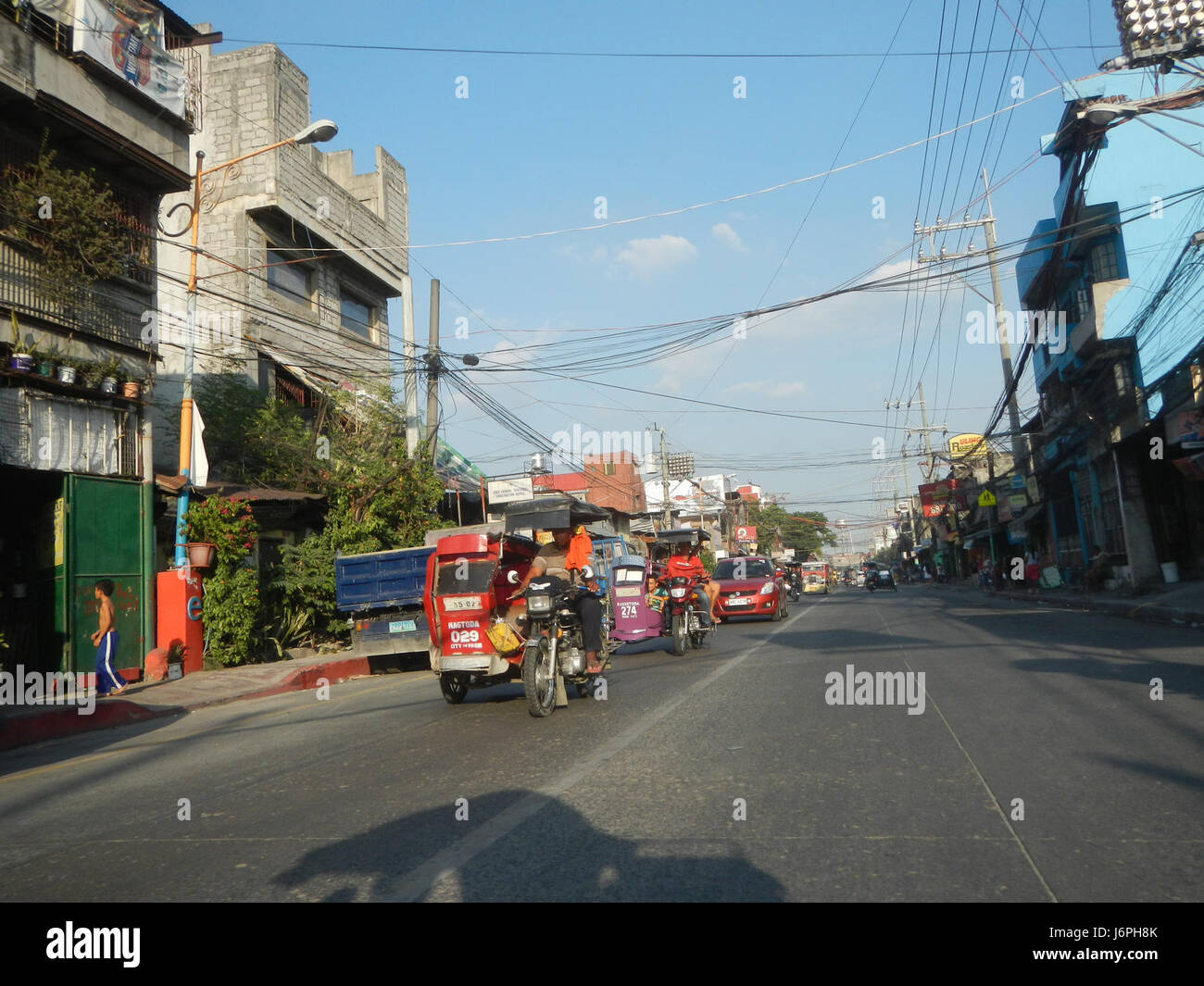This image showcases the Pasig City Hall, surrounding buildings, and ...