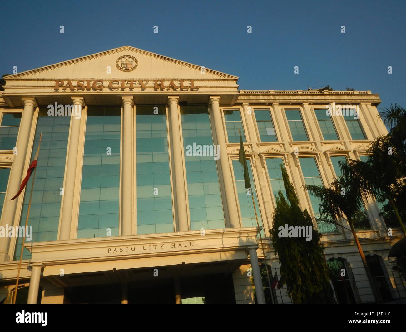 This image depicts the Pasig City Hall and its surrounding buildings ...