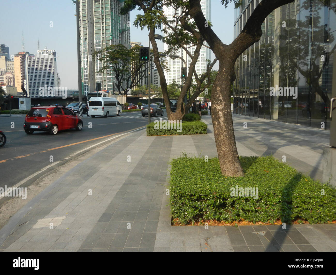 This image shows the Zuellig Building located at One Roxas Triangle ...