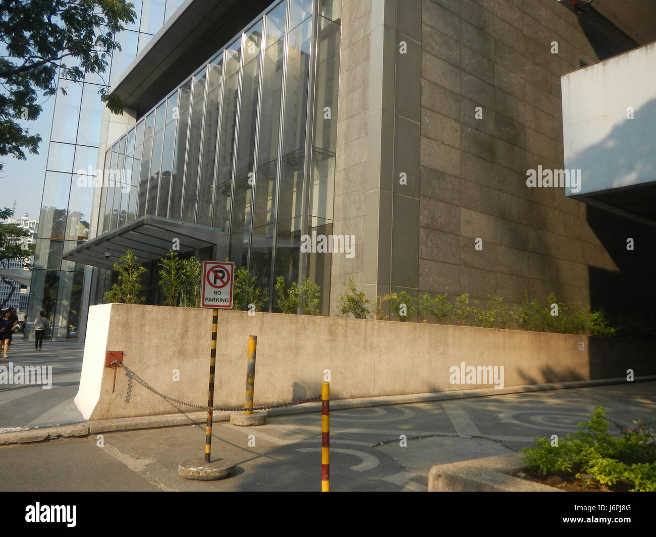 This image shows the Urdaneta Zuellig Building located along Sultan ...