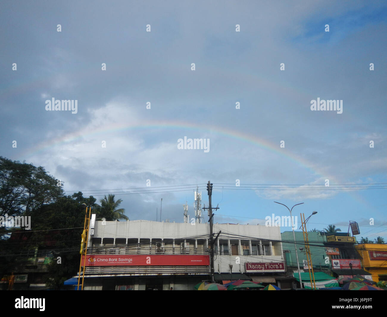 A scenic view of double rainbows over the Town Proper area of Baliuag ...