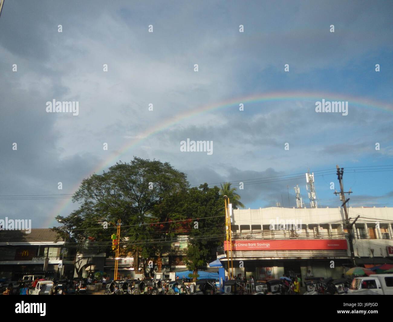 The image captures the rare natural phenomenon of double rainbows over ...