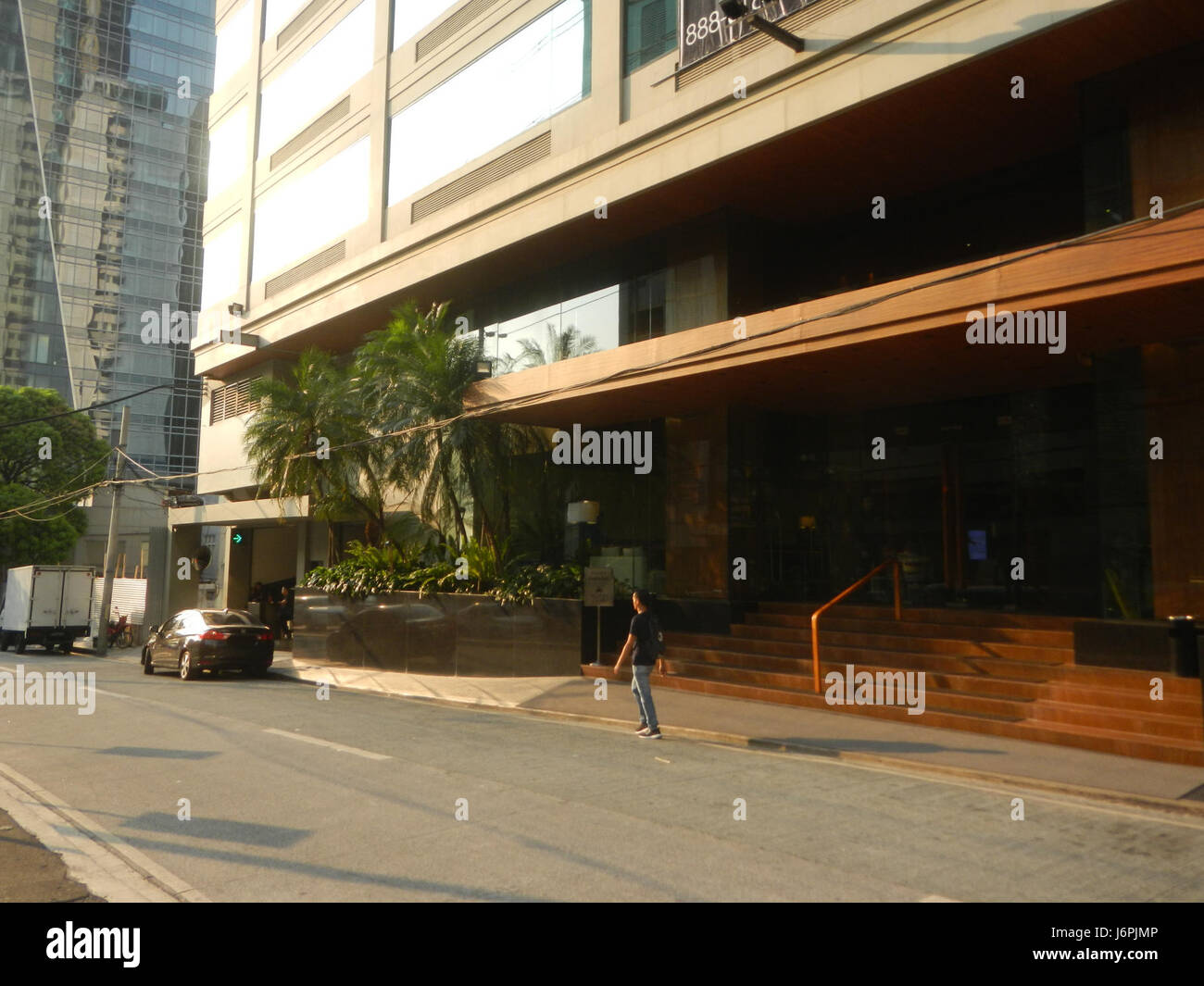 This photo highlights a street scene in Makati City, showing Neptune ...
