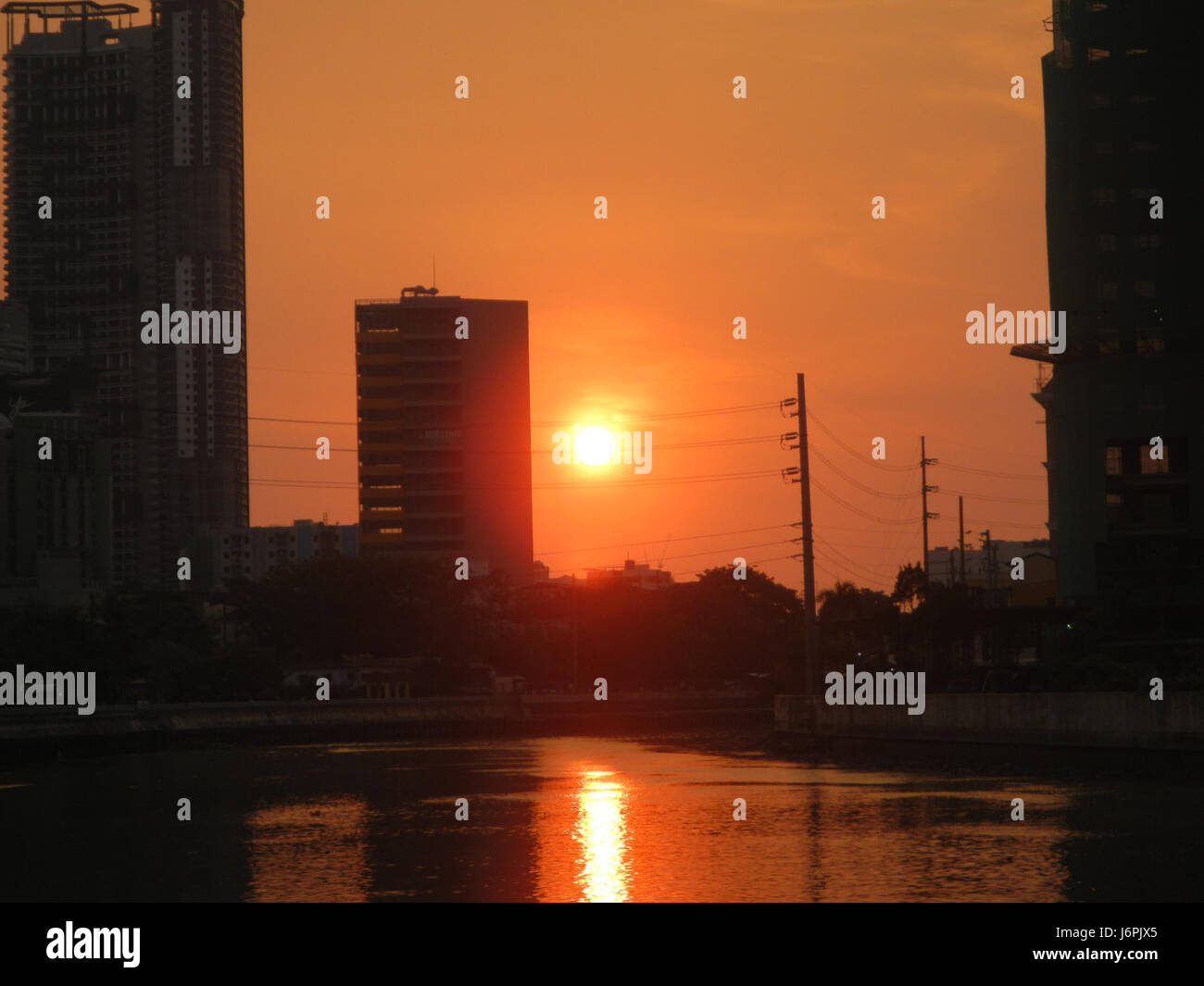 A photograph or artwork depicting the sunsets in Makati and Mandaluyong ...