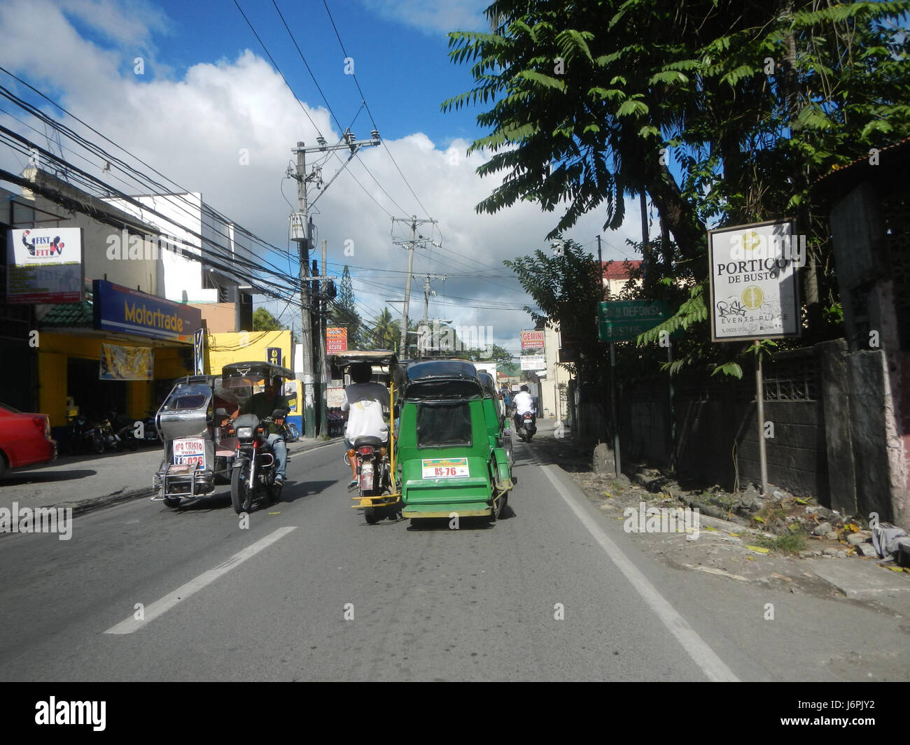 This photograph captures the streets and local landmarks of Poblacion ...