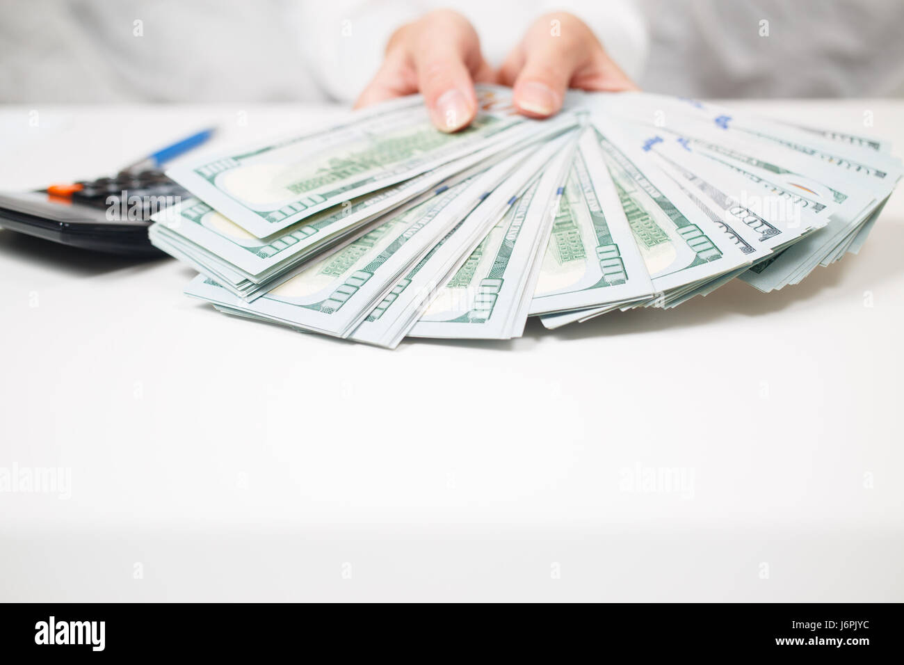 Hands with money Stock Photo - Alamy