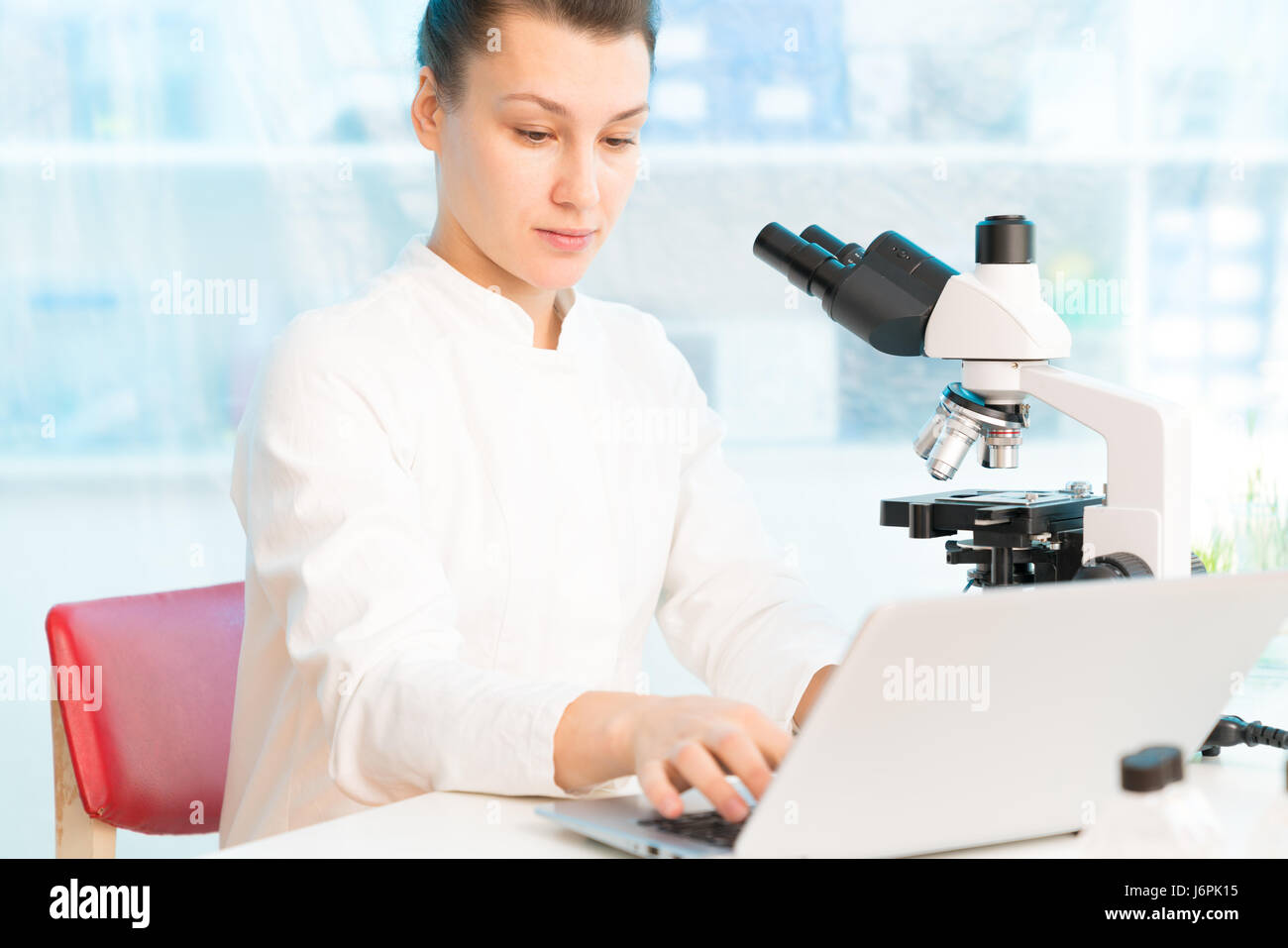 Food test in laboratory, Researcher with GMO plants. Genetically ...