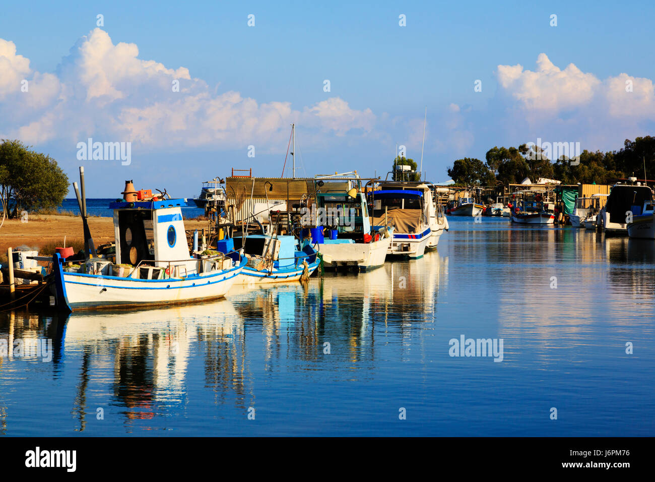 Traditional Cypriot fishing boats moored in Potamos Creek near Liopetri ...