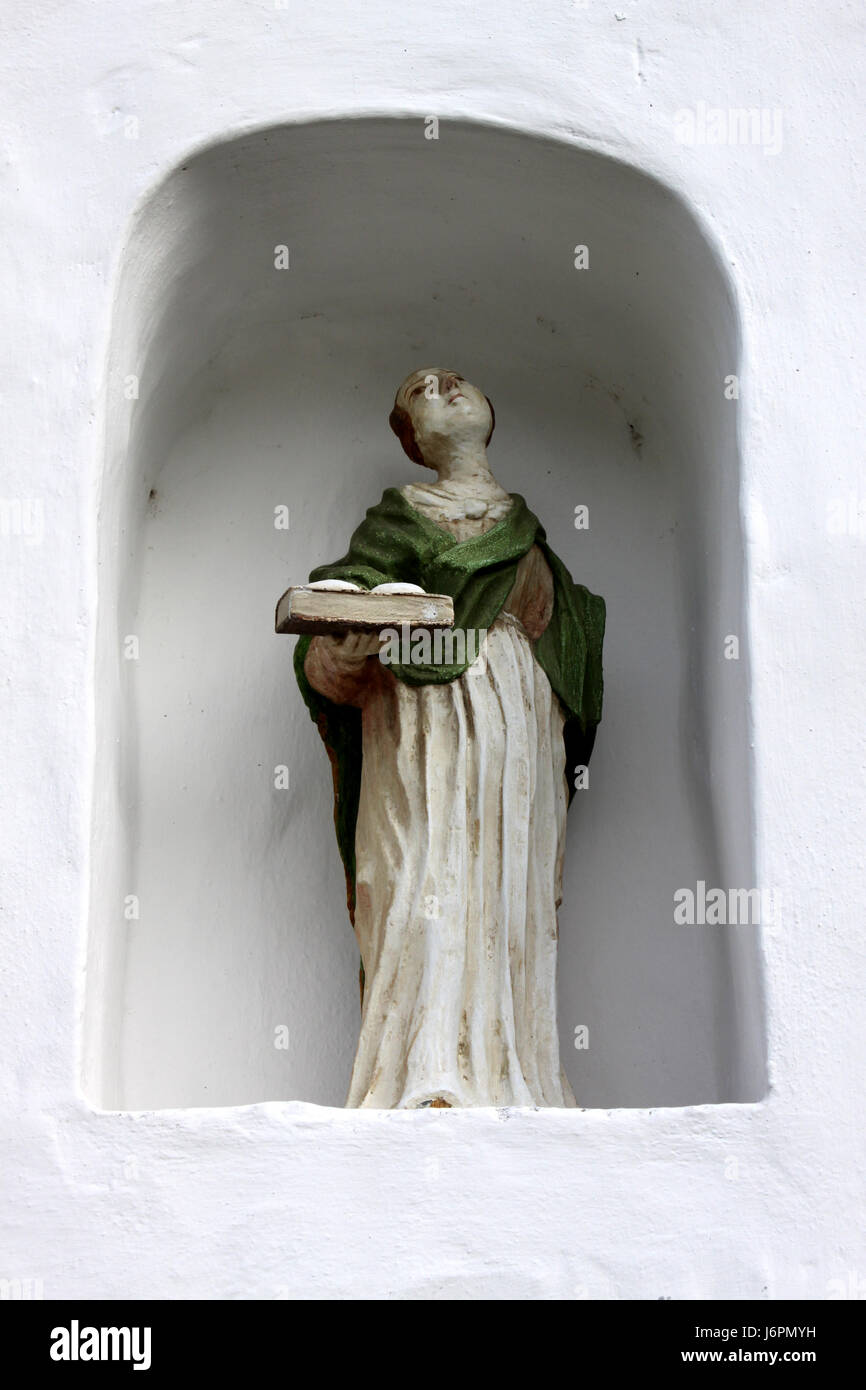 holy figure in a niche house Stock Photo - Alamy