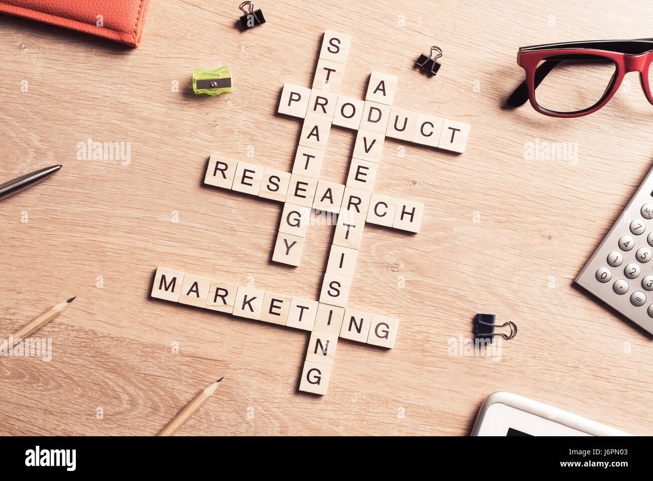 Conceptual business keywords on table with elements of game maki Stock ...