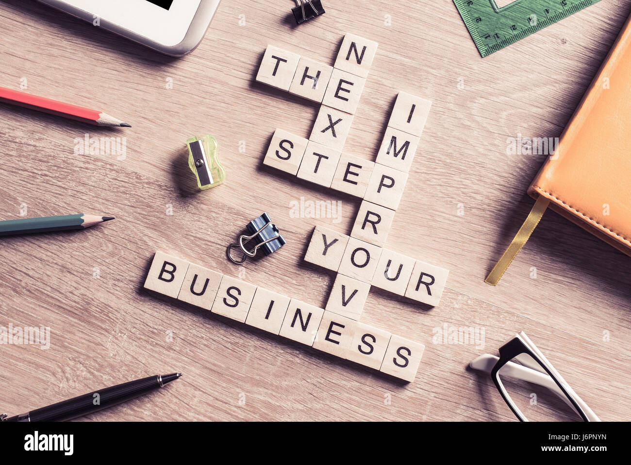 Conceptual business keywords on table with elements of game maki Stock ...