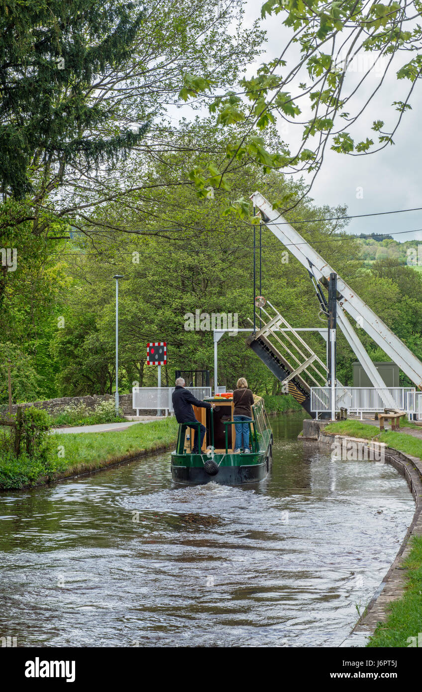 Narrowboat passing through Talybont canal Bridge Brecon Beacons south ...