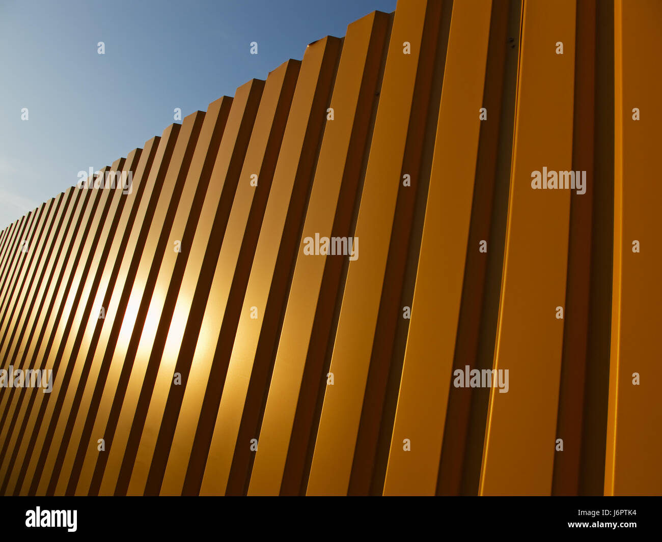 yellow metal wall Stock Photo - Alamy