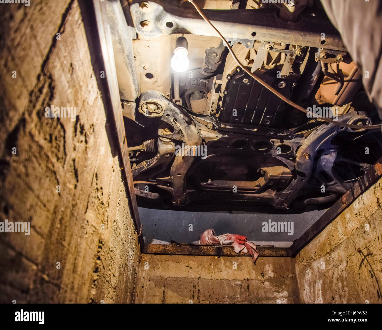 View of the car from below. Autoservice center. Car maintenance Stock ...