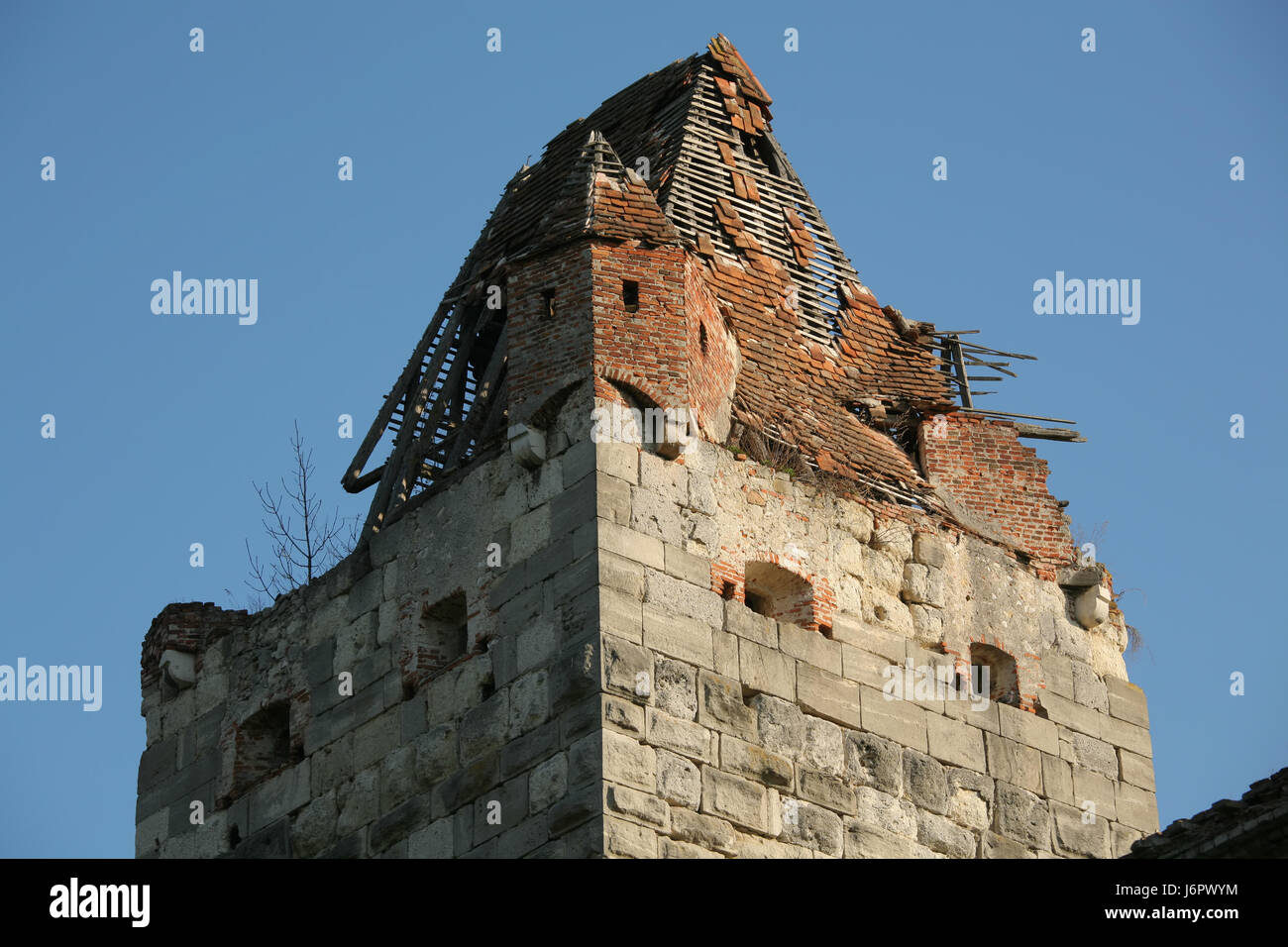 tower wall facade brick construction site tower window porthole dormer ...