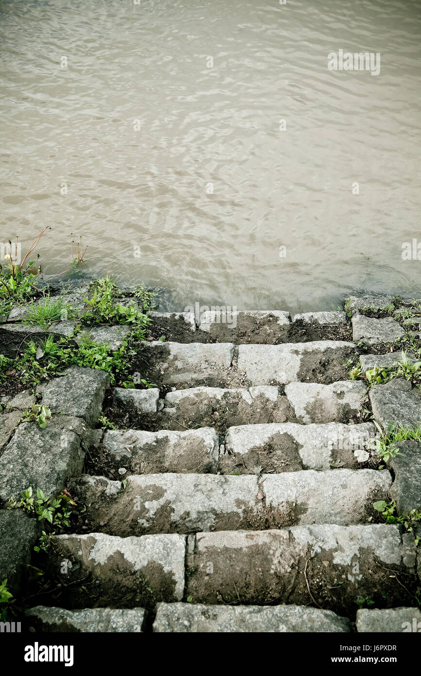 stairs dirty river water stairs stone mud dirty plants old lawn green ...