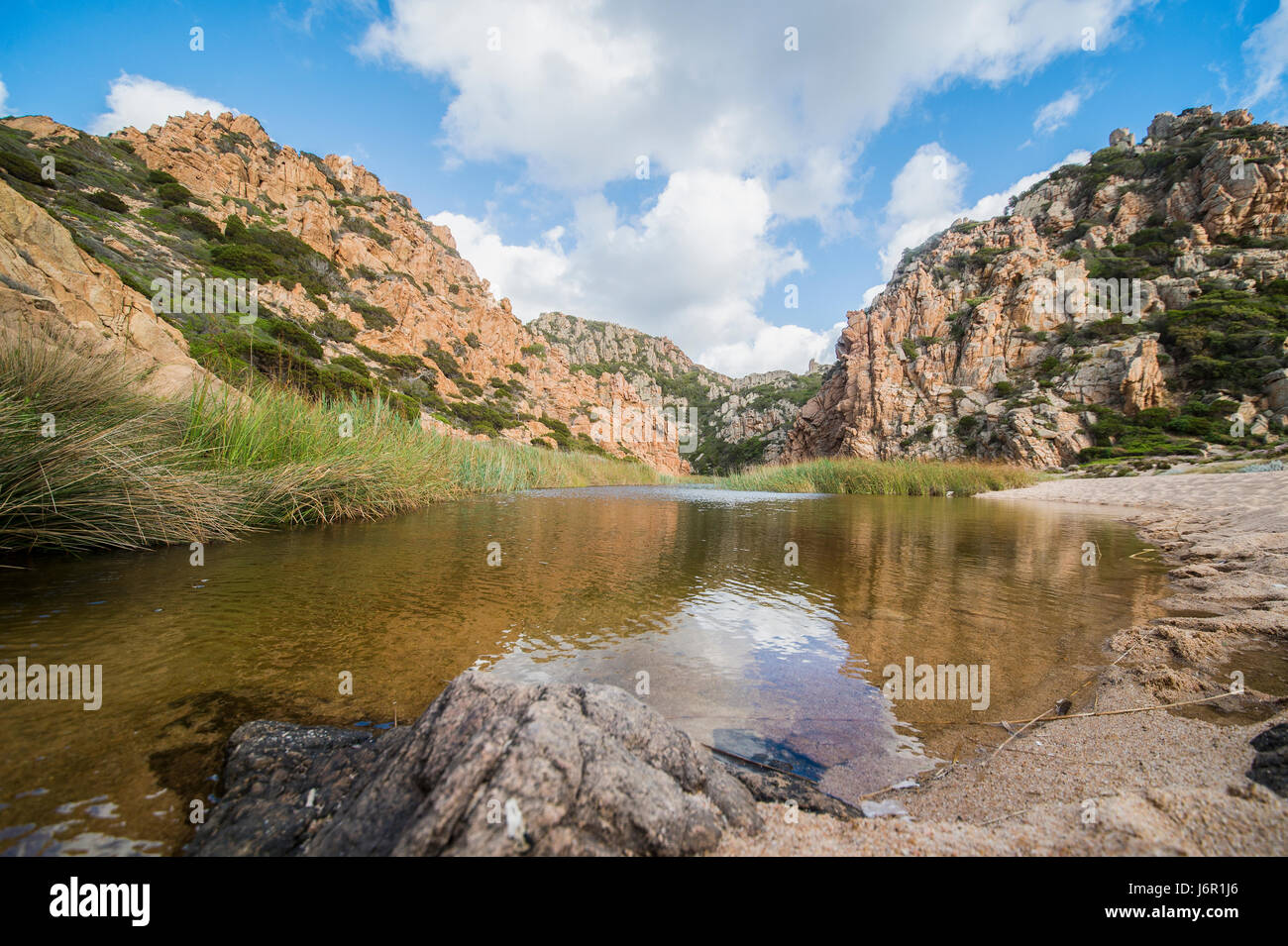 A beautiful natural river between the Italian mountains. River flowing ...