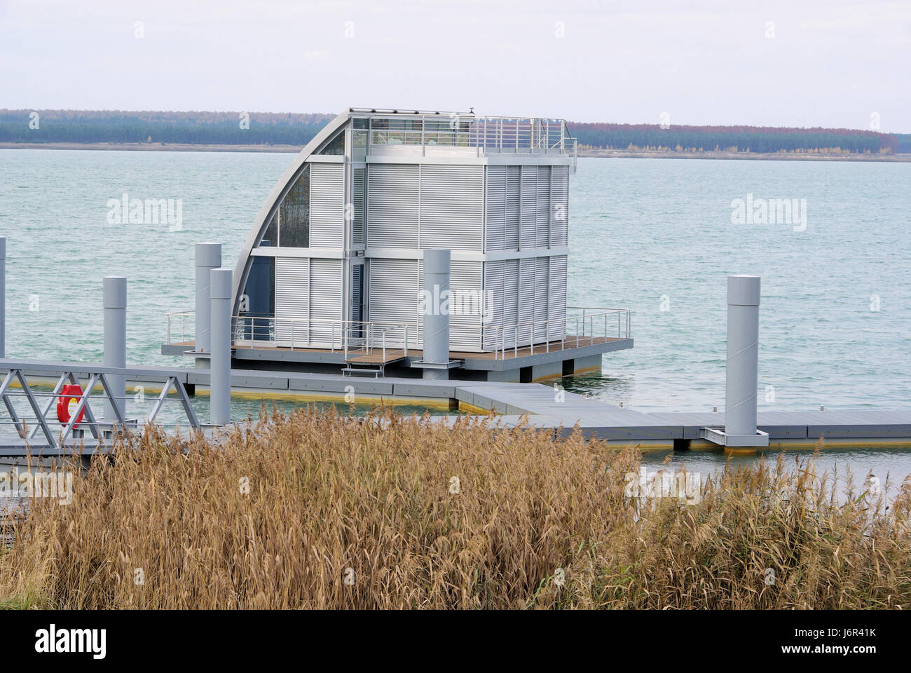 house building bridge houseboat salt water sea ocean water rowing boat ...