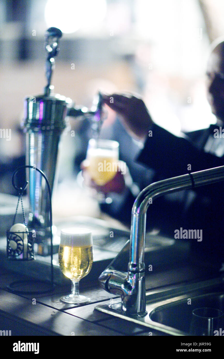 VIP wedding party evening marriage drinks reception with waiter and bar ...