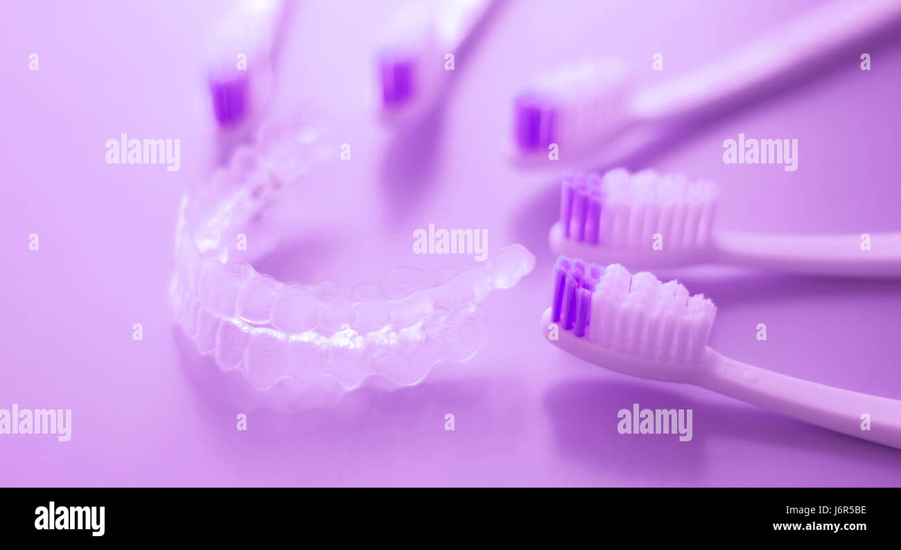 Dental toothbrush to clean teeth isolated with invisible plastic ...