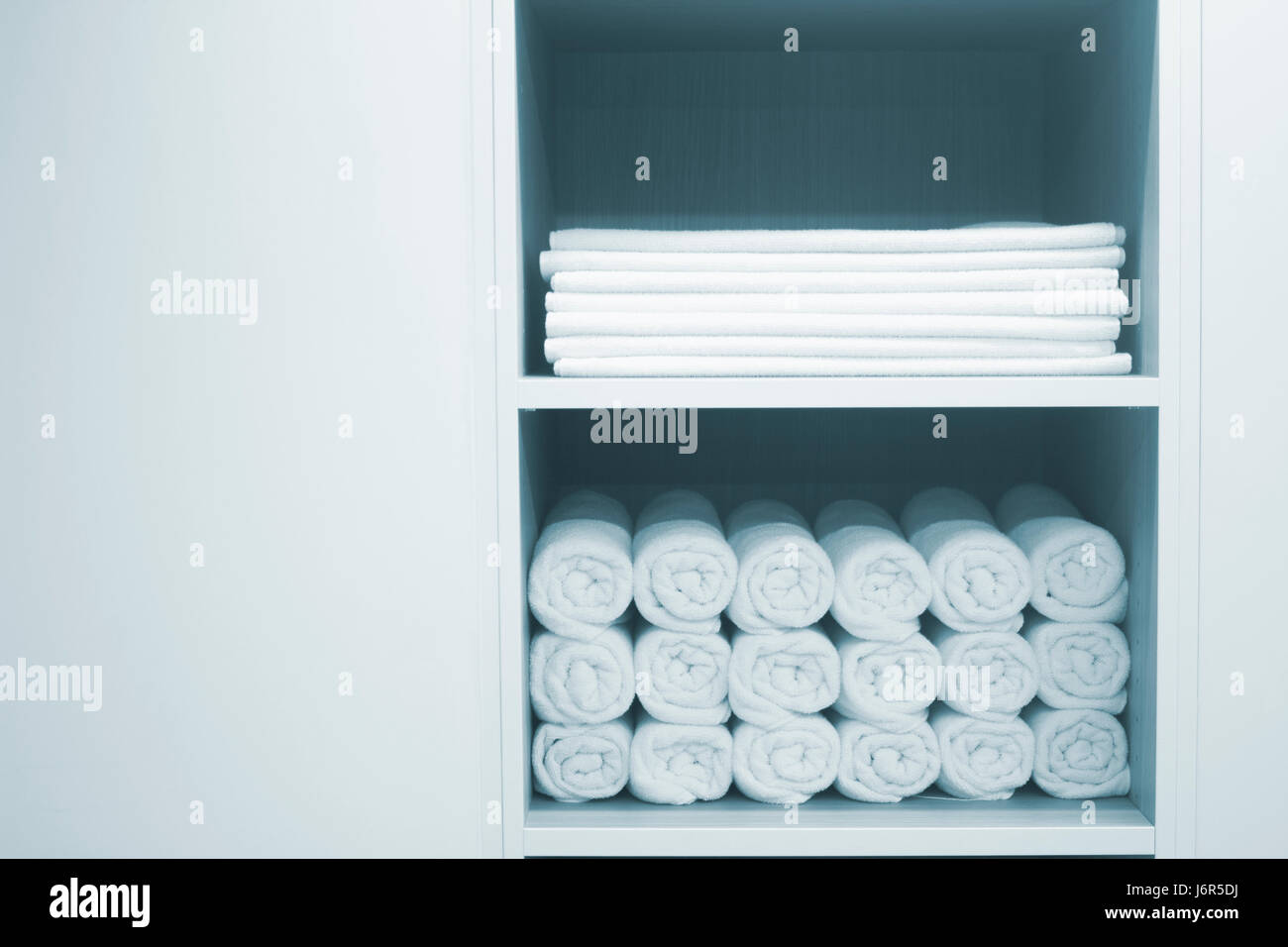 Clean pressed towels in luxury hotel health club spa resort for guests ...