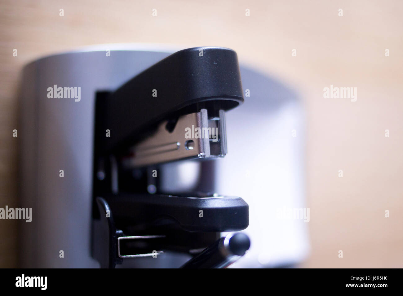 Office staple gun stapler on table in corporate company meeting room ...