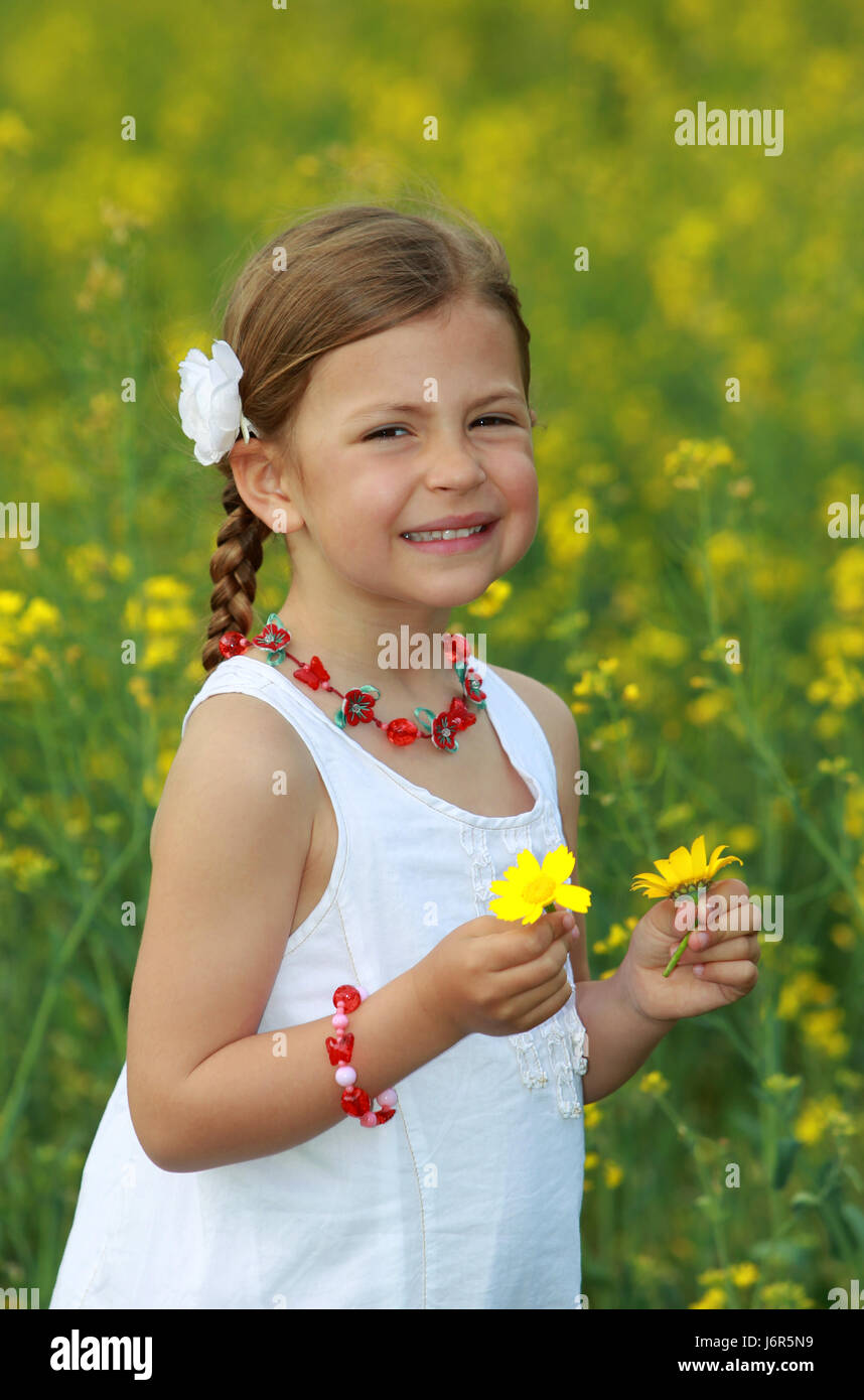 flower flowers plant daisy kid young younger child girl girls laugh ...