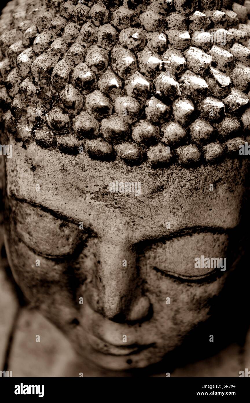 Face of a Budda statue Stock Photo - Alamy